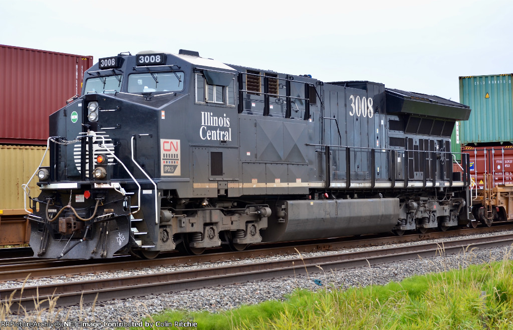 CN 3008, IC Heritage locomotive, the trailing DPU of WB unit stack train through Fisher and ...
